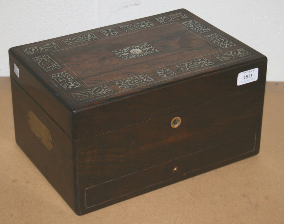 A Victorian rosewood vanity box, with mother-of-pearl inlaid decoration ...