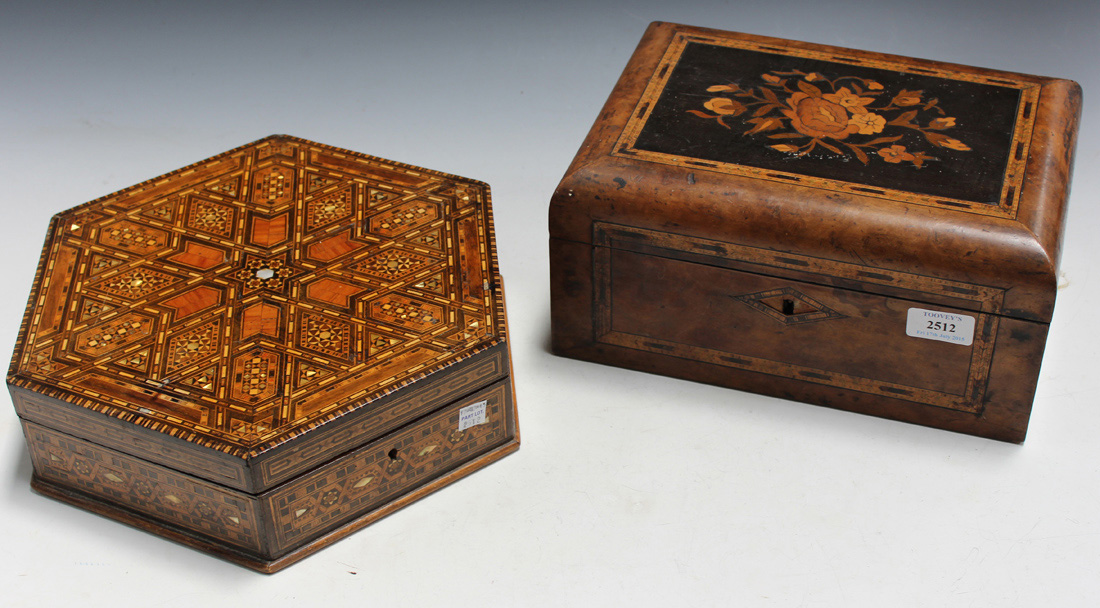 A Victorian walnut work box, the hinged lid inlaid with flowers and ...